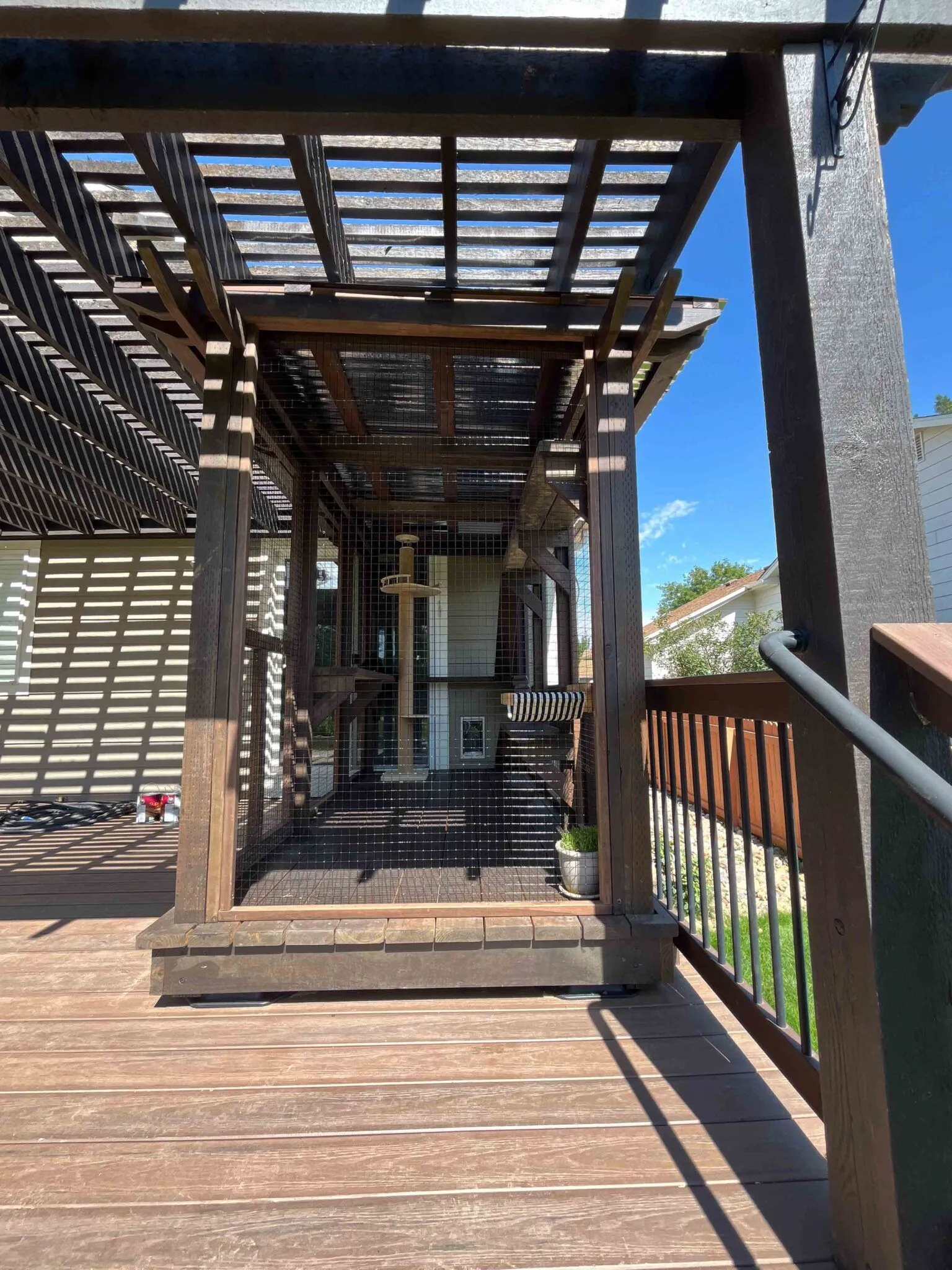 Enclosed Catio on Raised Deck | The Deck Den