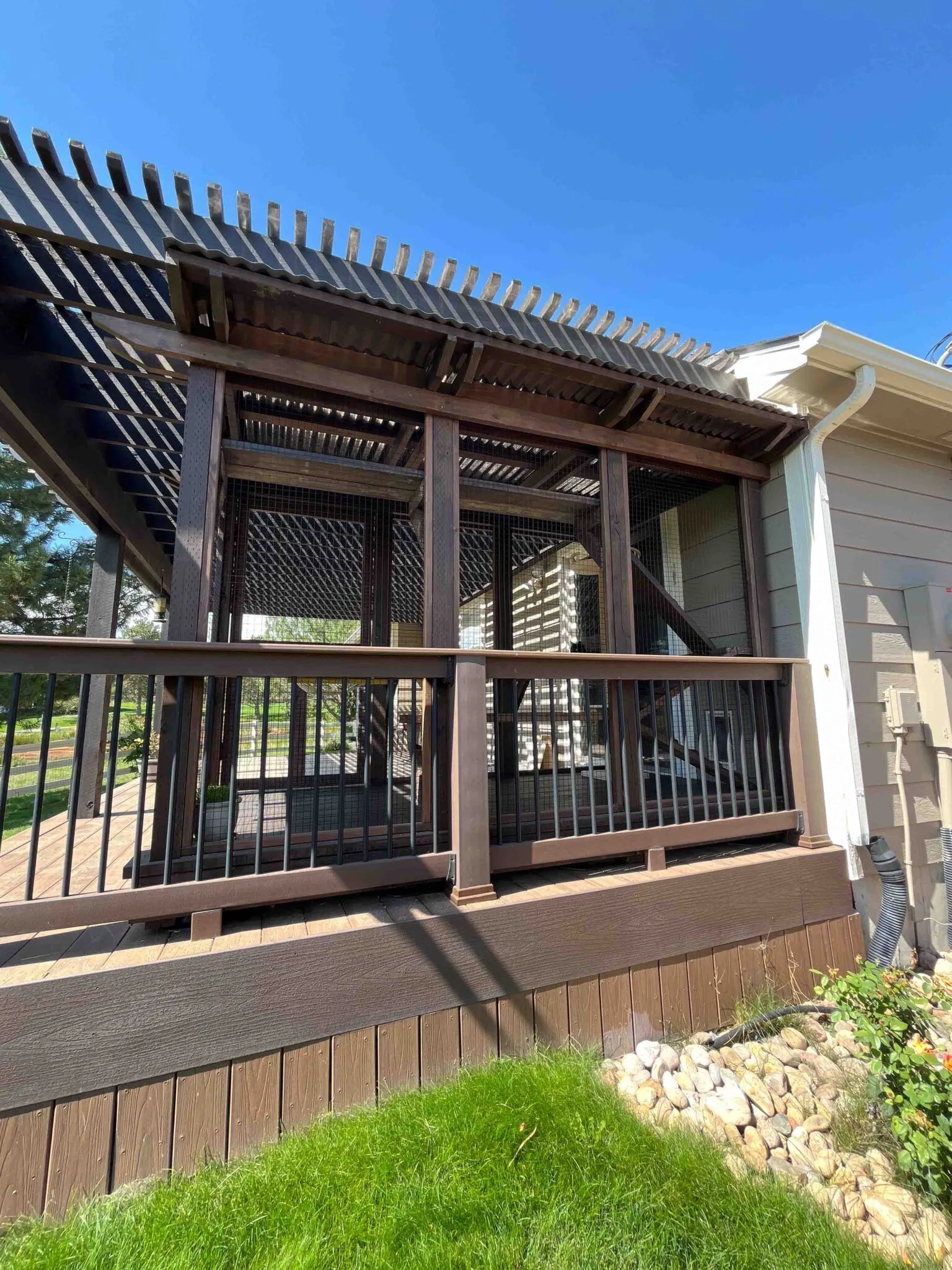 Enclosed Catio on Raised Deck | The Deck Den